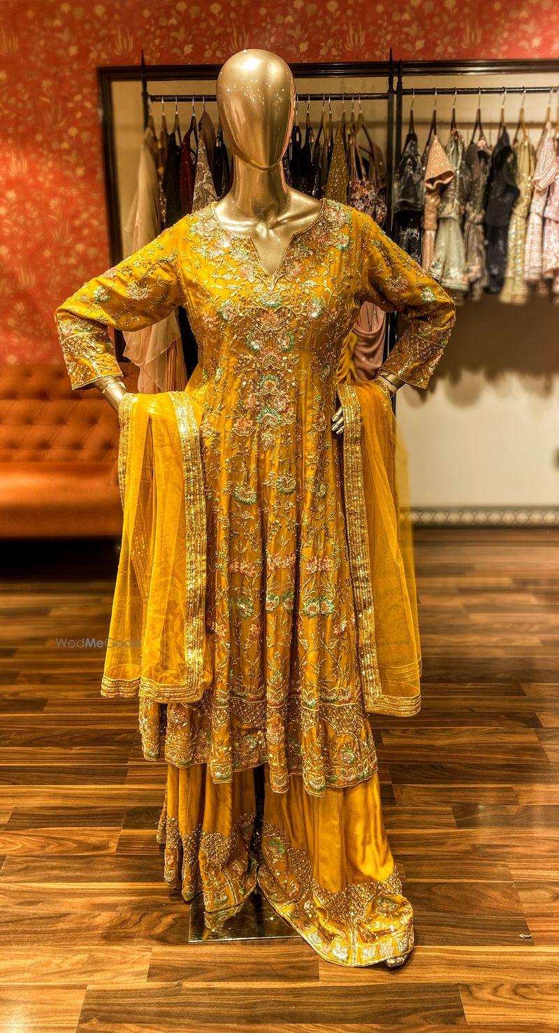 The luxurious mustard sharara set is a perfect representation of art and culture. This gorgeous ...